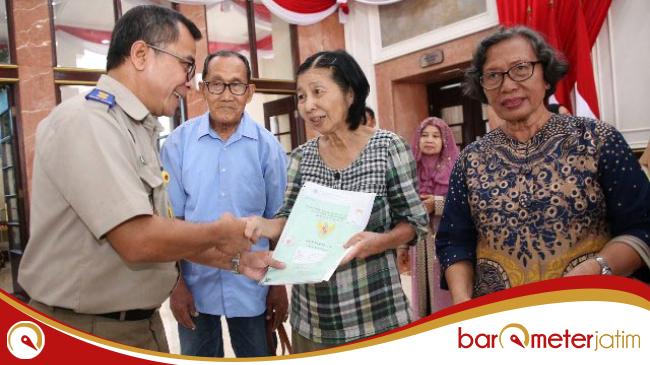 Disaksikan KPK hingga BPK, 39 Pemegang Surat Ijo di Surabaya Terima ...